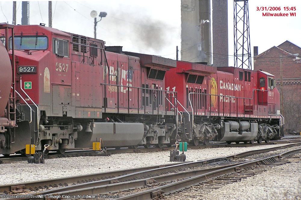 Beaver 8511 and Dual Flags partner pull east toward Burnham bridge